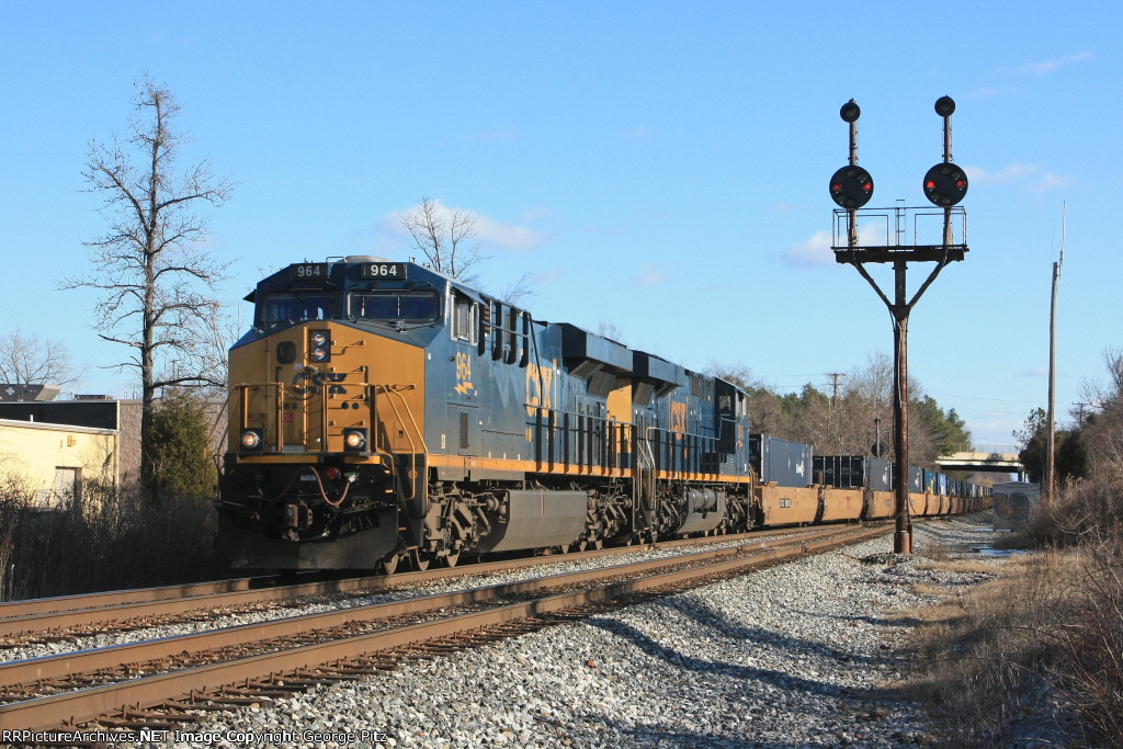 CSX 964 and train Q141